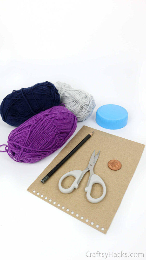 How to Make Yarn Pom Poms (Step-by-Step) - Craftsy Hacks